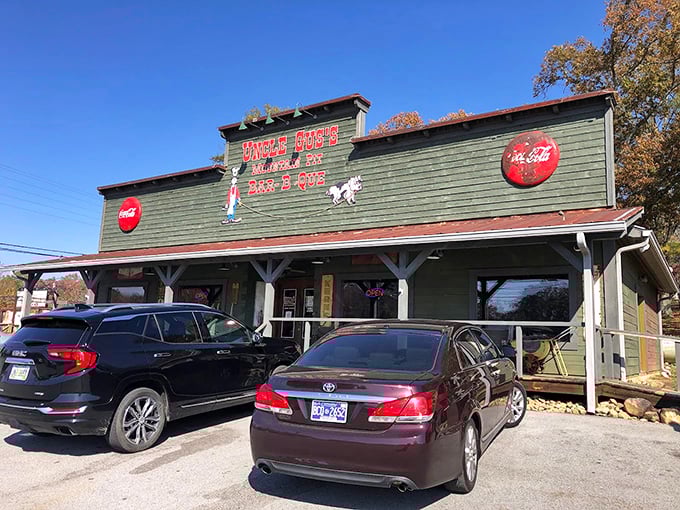 "Green wooden exterior, old-fashioned porch—like stepping into a country postcard where BBQ is the main attraction."
