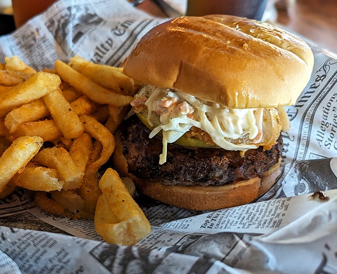 This isn't just a burger—it's a towering achievement of beef, bun, and toppings that demands both your respect and your appetite.