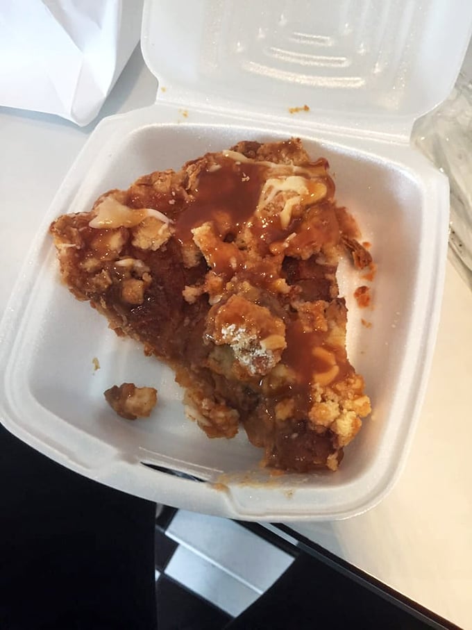 Apple crisp that would make Grandma nervous about her recipe supremacy. That cream cheese drizzle isn't just a topping—it's the closing argument in a delicious debate.