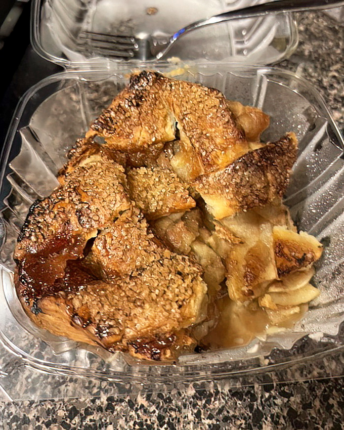 This isn't just apple pie – it's an architectural marvel of flaky pastry, caramelized fruit, and sesame seeds that somehow makes sense together.
