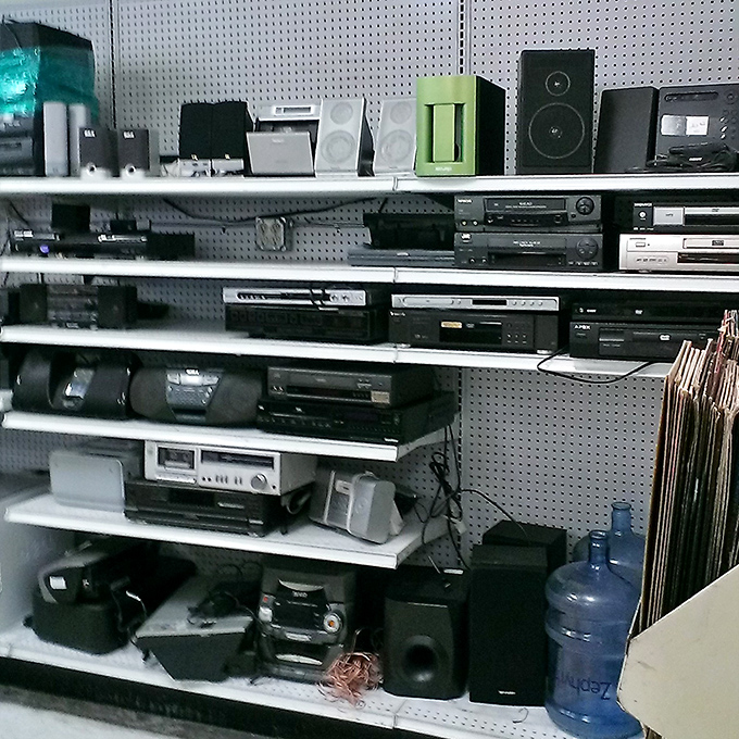 Yesterday's electronics waiting for tomorrow's homes. One person's outdated stereo system is another's vintage audio experience.