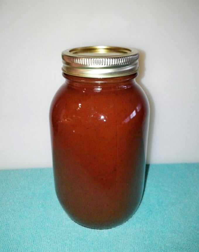 Liquid gold in a mason jar—Lem's sauce strikes that perfect balance between sweet, tangy, and just enough heat to keep things interesting.