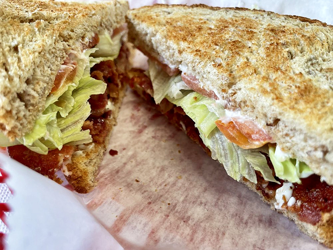 A BLT sandwich built with architectural precision and ingredients fresh enough to make your taste buds sing.