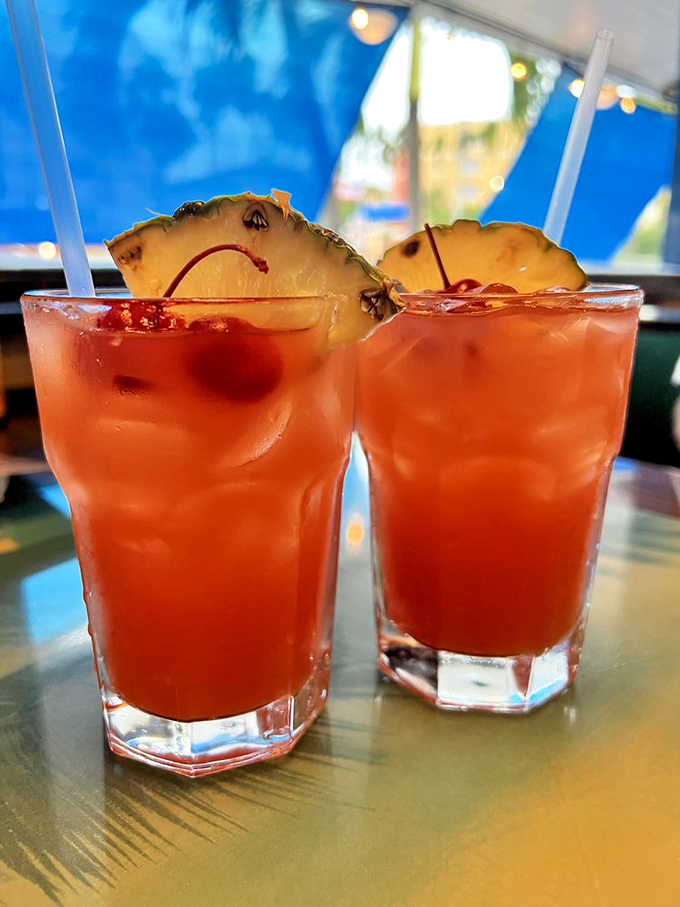 Tropical drinks that taste like vacation in a glass. These rum-forward beauties with pineapple garnish are Florida's liquid sunshine.