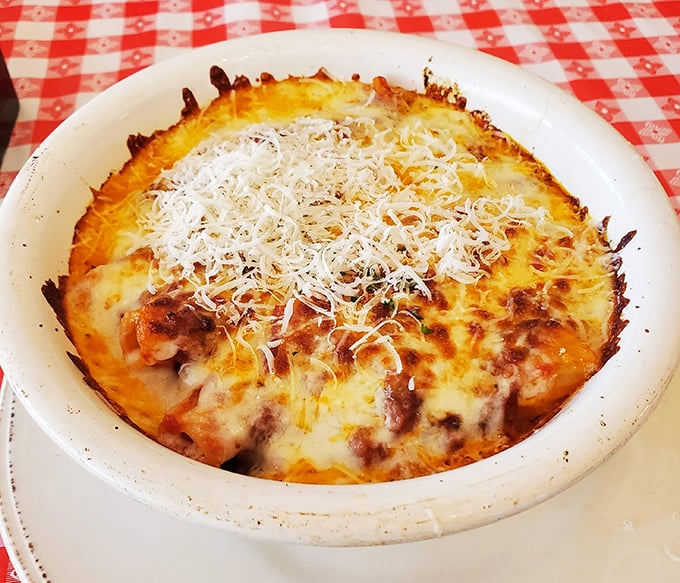This baked rigatoni isn't just dinner – it's a bubbling cauldron of cheese and tomato that whispers, "Diet? What diet?"