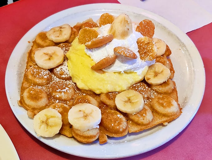 Waffles crowned with bananas, whipped cream, and what appears to be pure joy. Dessert masquerading as breakfast is my kind of rebellion.
