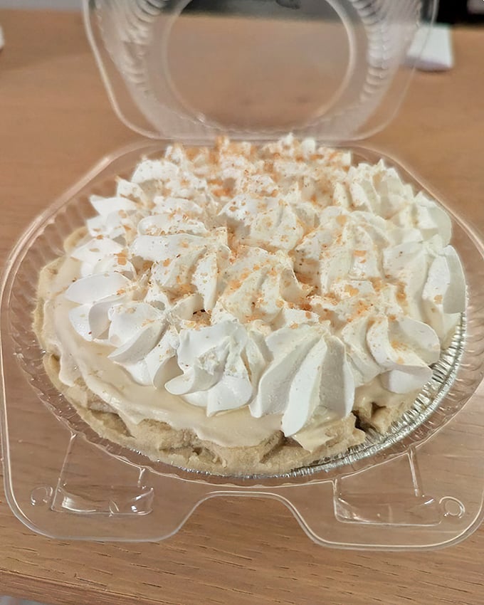 This banana cream pie isn't just dessert – it's cloud-like whipped cream perfection atop banana custard that would make your grandmother jealous.