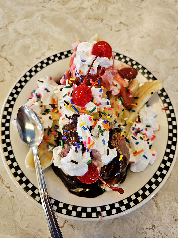 This isn't just a banana split—it's a childhood memory served in a dish, complete with sprinkles that add both color and nostalgia.