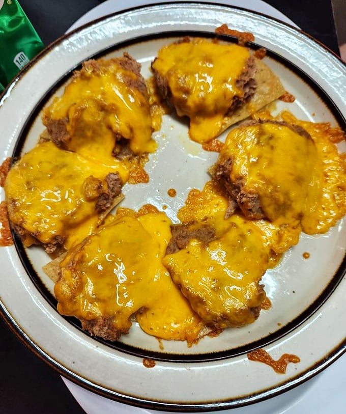 Those cheesy nachos aren't just appetizers—they're a spiritual experience with melted cheddar playing the role of enlightenment.