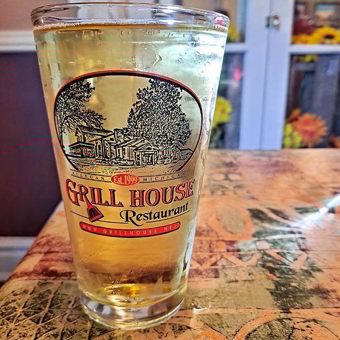 A cold beer in branded glassware—because hydration is important when embarking on serious culinary adventures in Michigan's heartland.