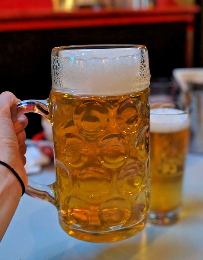 Cold beer and warm vibes – the universal language of a perfect casual dining experience.