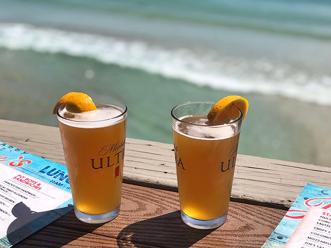 Cold beer, warm breeze, and endless ocean views – somebody pinch me, this can't be real.