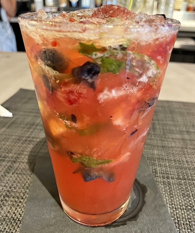 Summer in a glass! This berry-studded refresher isn't just a drink—it's what happens when fruit decides to throw a party and everyone's invited.