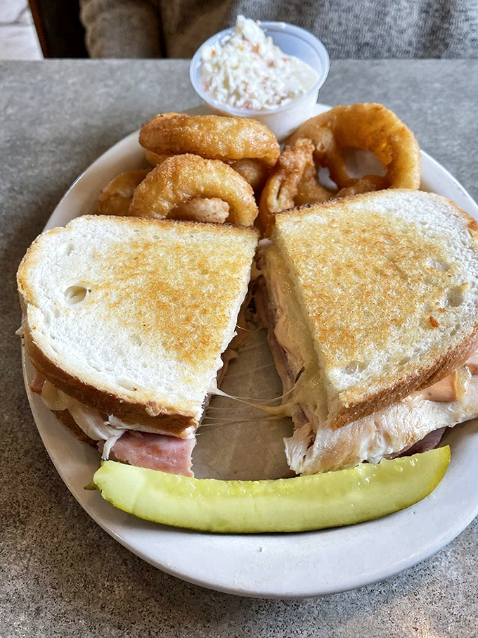 This sandwich isn't just stacked—it's architecturally sound. The melty cheese pulls away like it's auditioning for a food commercial.