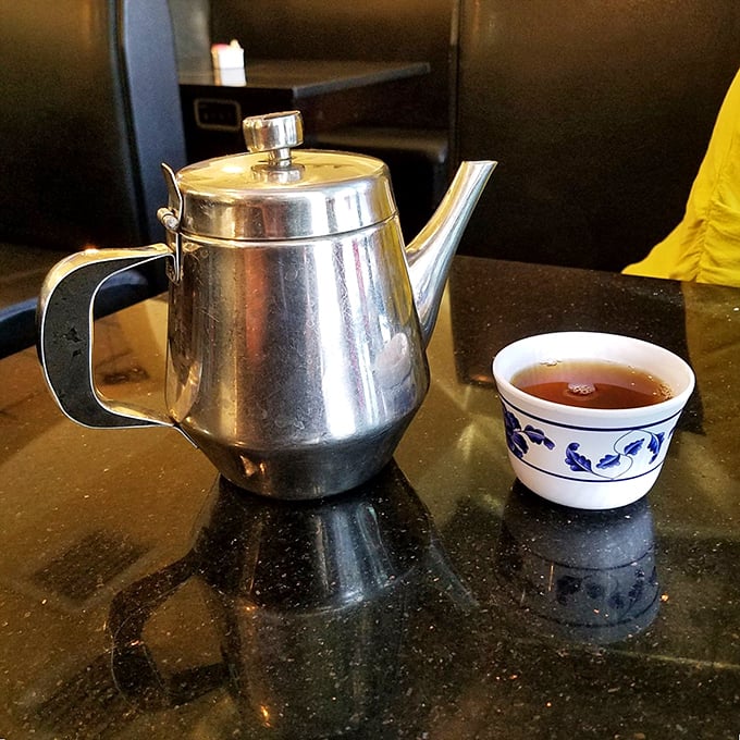The classic silver teapot and blue-patterned cup – a timeless intermission between acts in this all-you-can-eat theater.