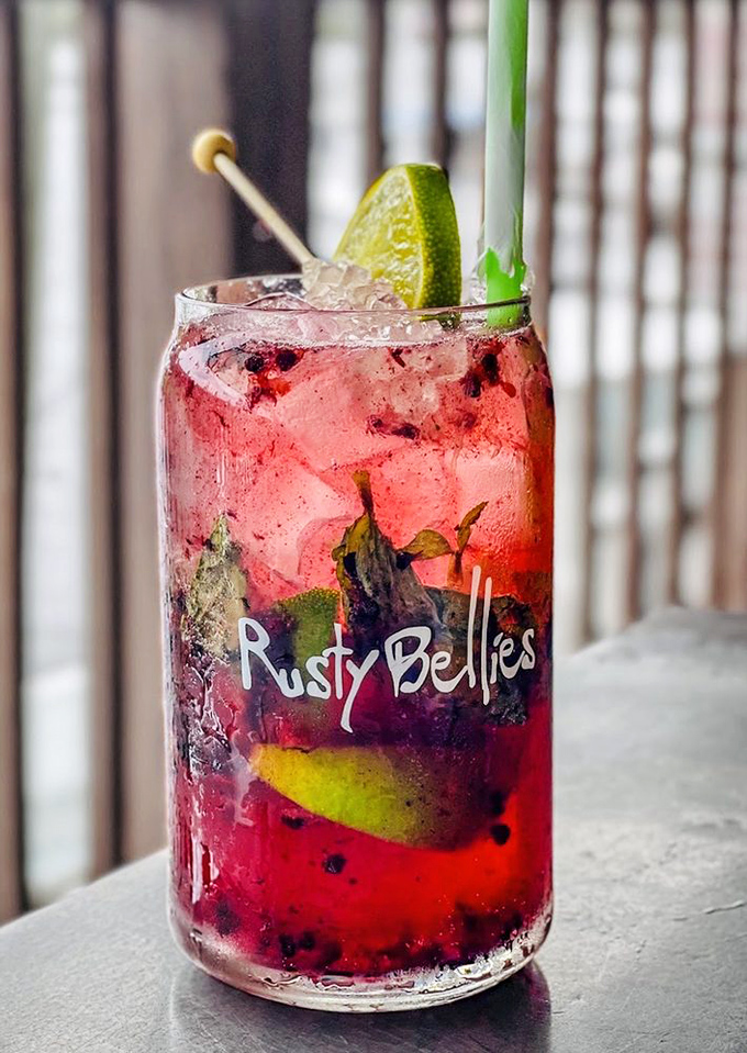 This isn't just a mojito—it's Florida in a glass. Blackberries and mint having a party while rum plays chaperone.