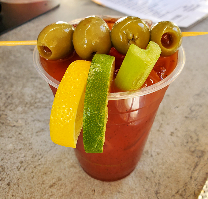 Not just a drink, but a meal in a glass – this Bloody Mary with its olive skewer is practically begging to be photographed before sipping.