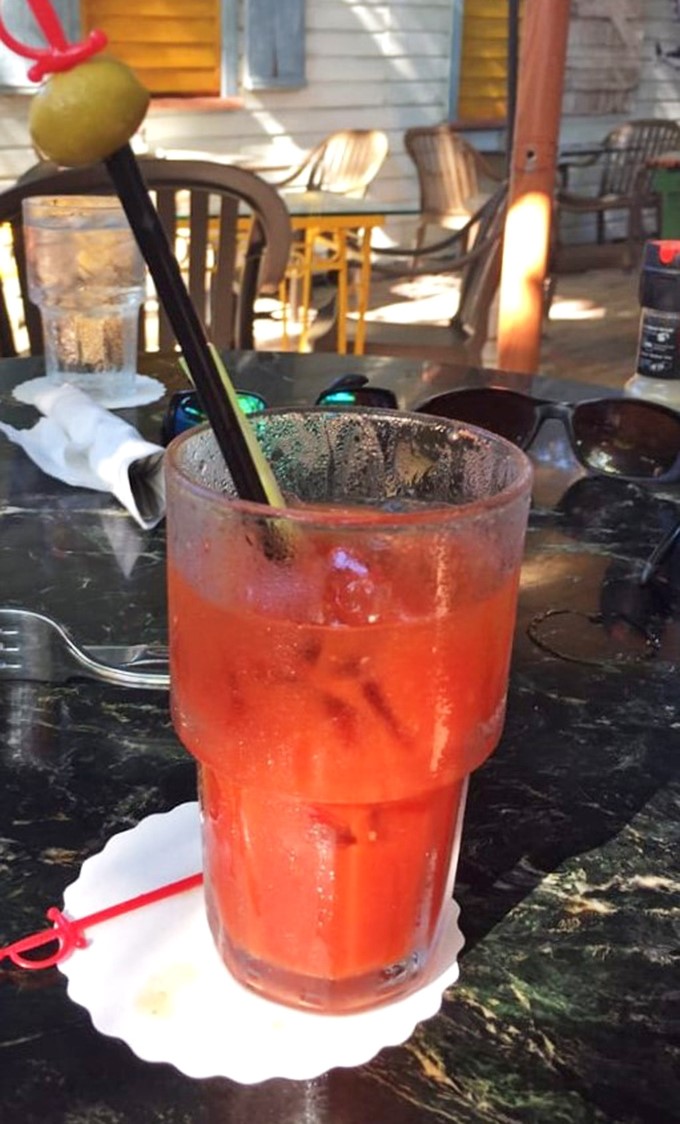 A proper Bloody Mary at Blue Heaven isn't just a drink—it's a liquid brunch that happens to come with an olive spear and vacation vibes.