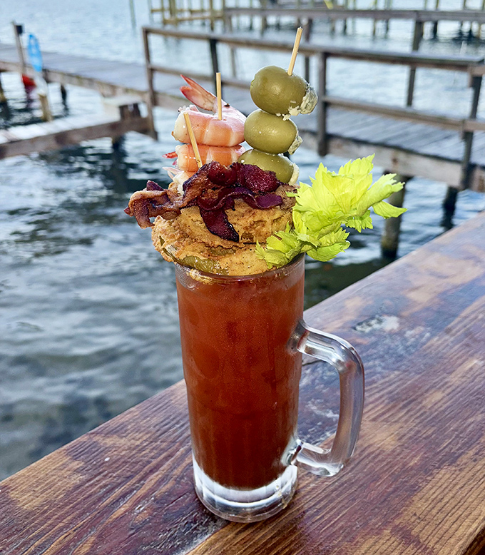 A Bloody Mary with enough garnishes to count as a small meal—the kind of drink that makes you wonder why anyone bothers with plain tomato juice.
