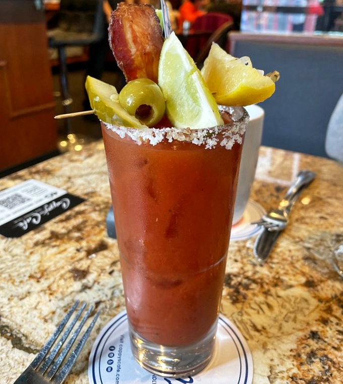 The Bloody Mary that puts other morning cocktails to shame – garnished with enough appetizers to qualify as a first course.