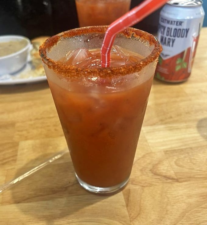 A Bloody Mary with a spice-crusted rim that's not just a drink—it's practically a side dish with benefits.