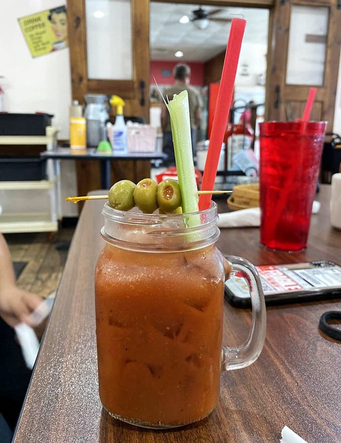 A Bloody Mary that means business, garnished with enough vegetables to count as a salad course.