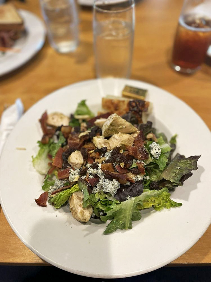 A salad that actually excites! Crisp greens playing host to bacon, blue cheese and chicken—proof that "eating healthy" doesn't mean punishment.