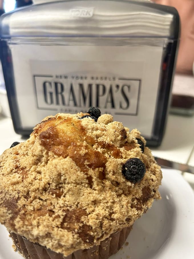 Not all heroes wear capes—some wear crumb toppings and hide blueberries inside. This muffin deserves its own spotlight at Grampa's bakery counter.