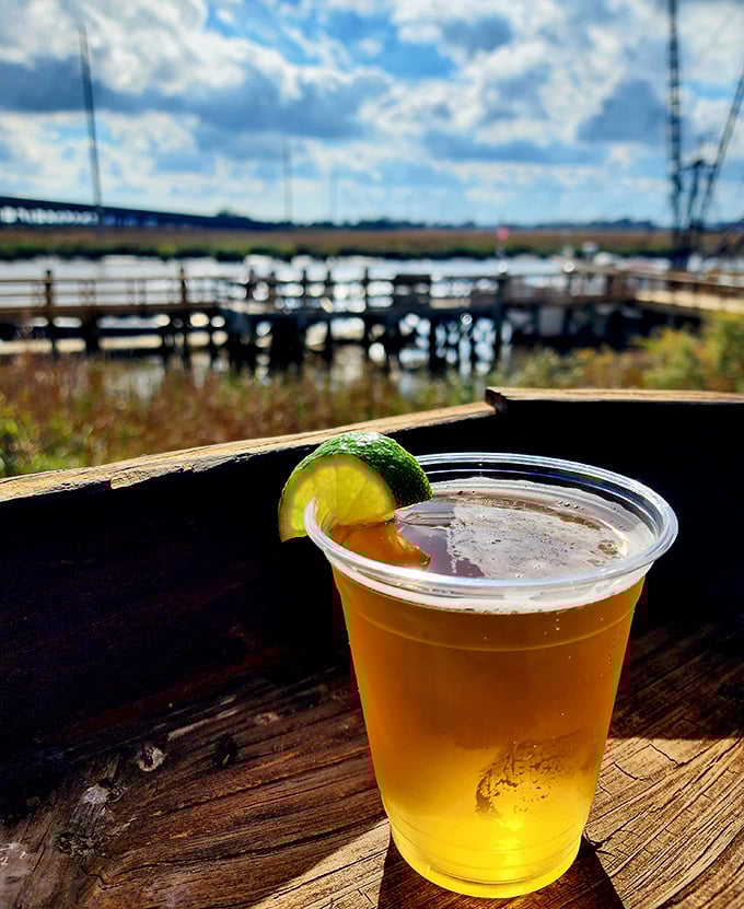 Nothing complements a waterfront view like a cold beer with a lime hat, posing against a backdrop of boats and endless marsh.