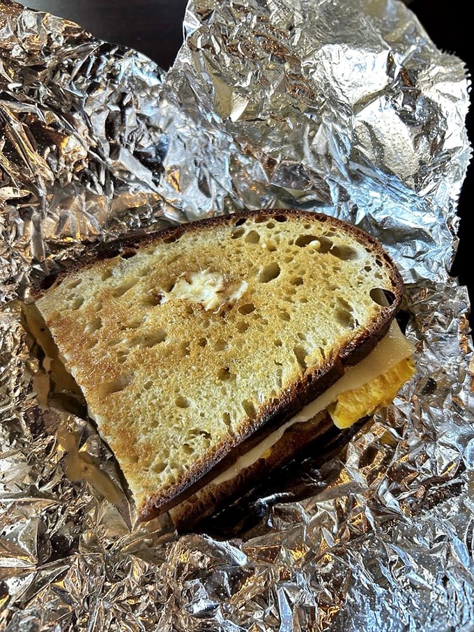 Not all heroes wear capes—some come wrapped in foil, hiding melty cheese and perfectly toasted sourdough that makes breakfast worth waking up for.