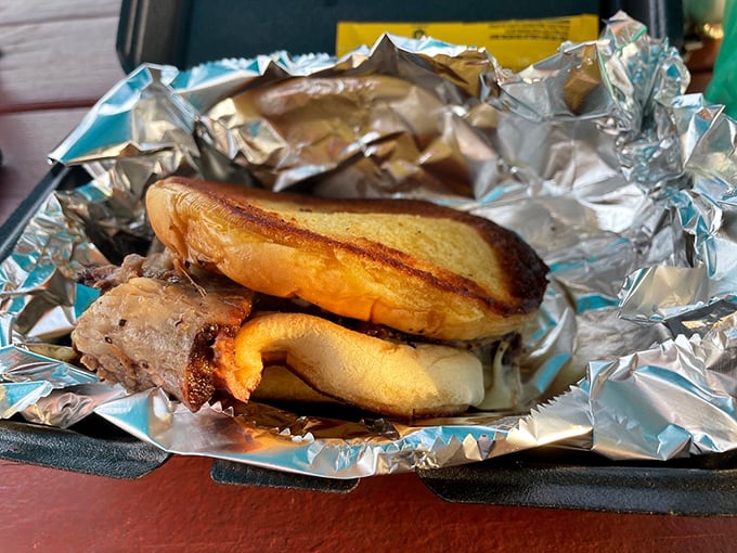 A brisket sandwich that doesn't need fancy presentation—just aluminum foil to contain all that smoky, melty goodness between two pieces of bread.