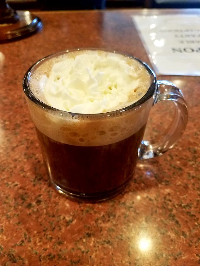 The café diablo—where coffee meets drama in a clear mug. This isn't your average morning brew; it's breakfast theater.