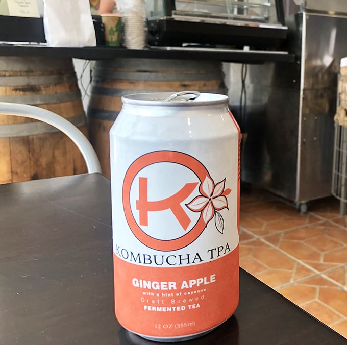 Even the beverages keep it local with craft kombucha—because nothing pairs with artisanal bread quite like fermented tea with a kick.