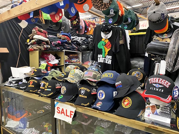 Military pride and sports loyalty displayed in rows of carefully arranged caps. Each hat tells a story—some of service, others of heartbreaking Cubs losses.