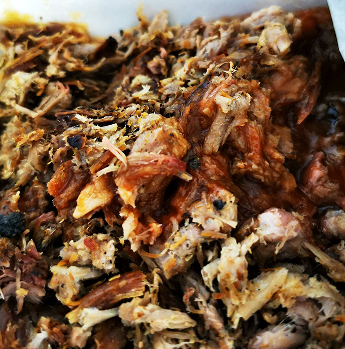 Chopped pork in its purest form—a beautiful mosaic of bark, tender meat, and smoke that makes you question all other food choices.