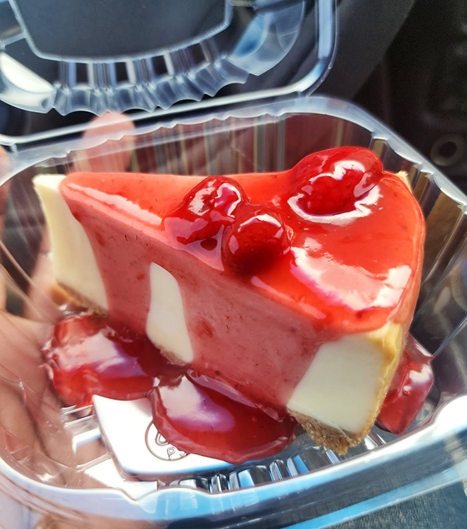 Cheesecake topped with cherry sauce that your grandmother would approve of—simple, honest, and completely irresistible.