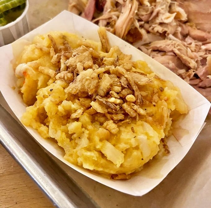 Cheesy potatoes that make you question why you've wasted time eating potatoes any other way. The crispy bits on top are like little flavor treasures.