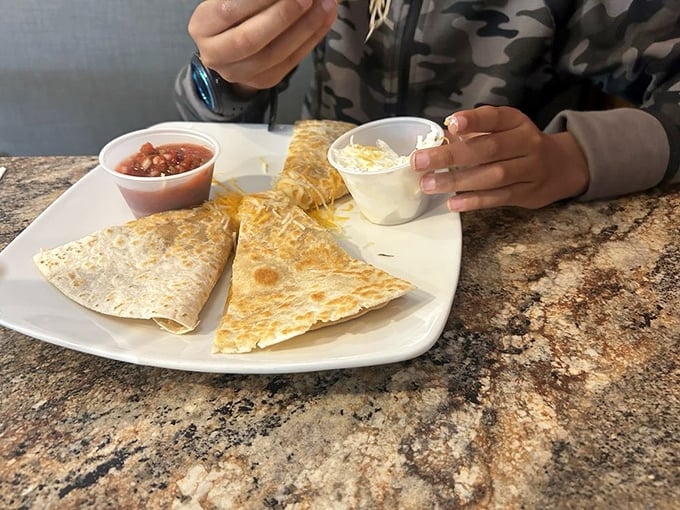 Quesadillas that make you question why you'd ever settle for a boring sandwich again—cheese pulling off that perfect stretch with each bite.