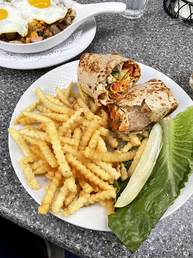 This wrap isn't just lunch—it's architectural brilliance with crispy fries that could make a Frenchman weep with joy.