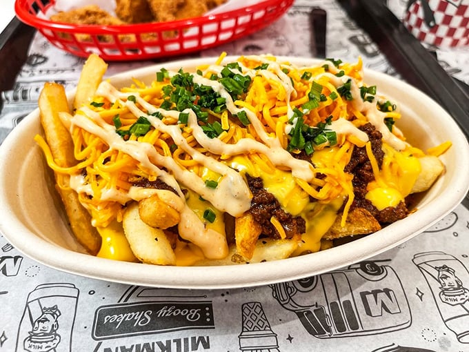 Loaded fries that blur the line between side dish and main event—a glorious mess of cheese, chili, and zero regrets.