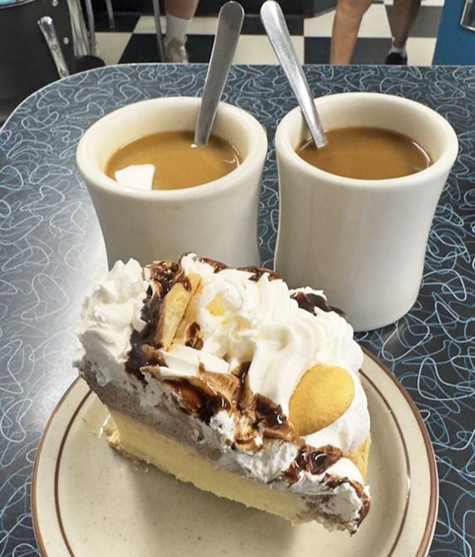 The kind of pie that makes you consider ordering dessert first—because life is uncertain, but the deliciousness of this chocolate banana cream masterpiece isn't.