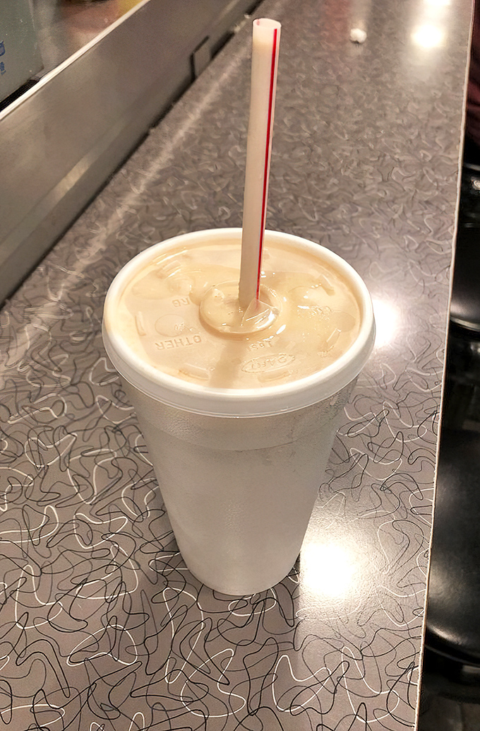 The milkshake thick enough to require serious straw commitment – worth the effort and the brain freeze that inevitably follows.