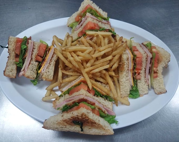 The club sandwich: three layers of bread engineering that proves sometimes the classics become classics because they're just that good.