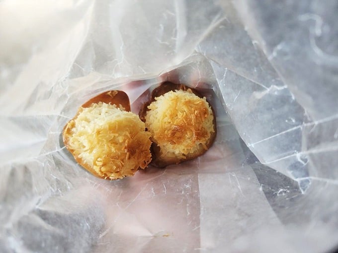 These coconut macaroons look like tiny snowballs that took a detour through paradise. Crisp exterior, chewy interior—textural poetry in bite-sized form.