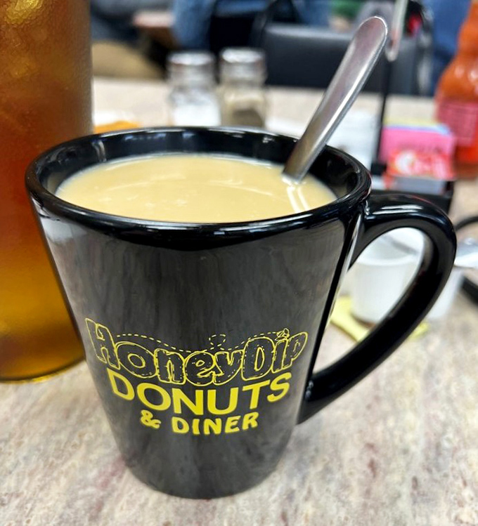 That coffee mug—sturdy, no-nonsense, and filled with honest diner brew. No single-origin Ethiopian pour-over needed when the coffee's this satisfying.