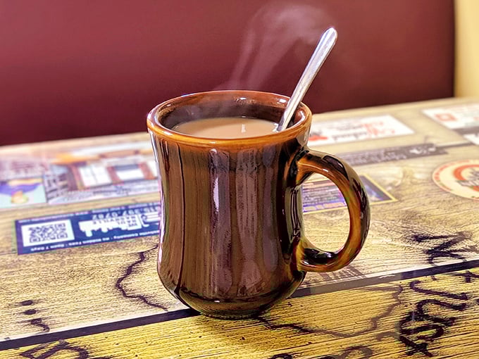 The humble brown coffee mug—delivering liquid motivation in its purest form. No foam art needed when the coffee's this good.