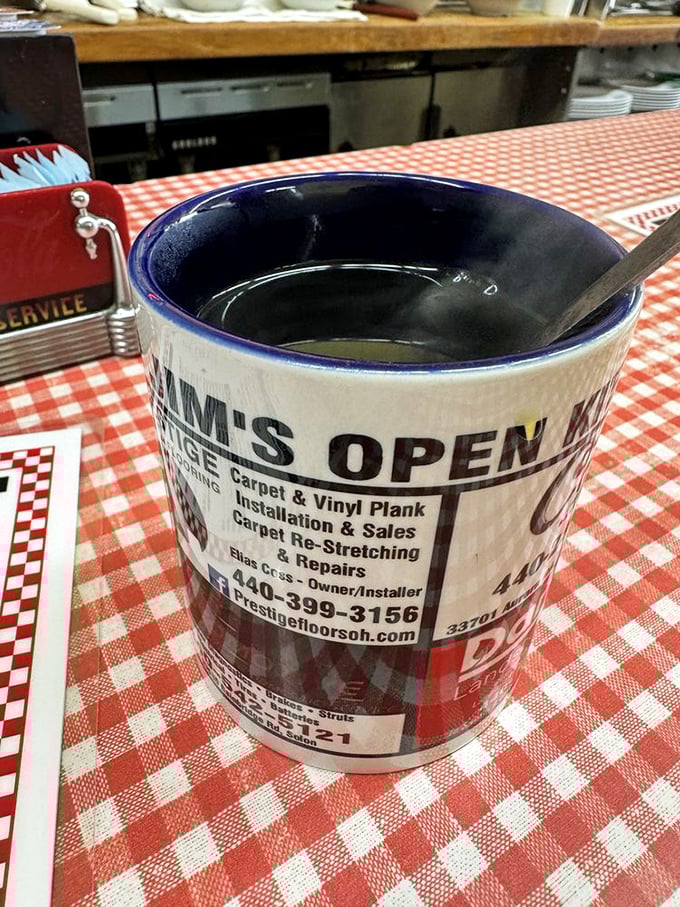 Even the coffee mug tells a story – local business advertising meets classic diner charm perfectly.