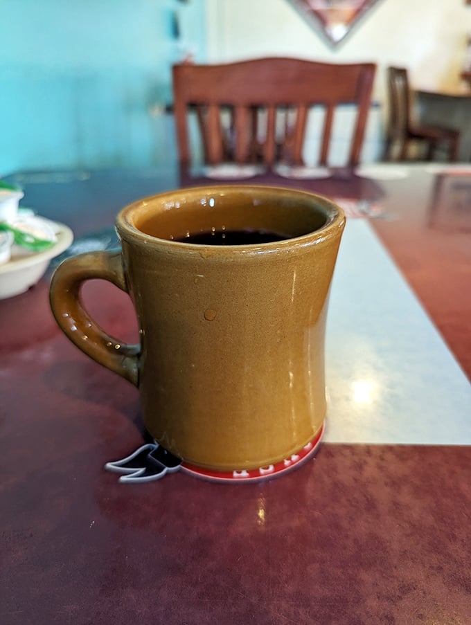 The humble diner coffee mug—civilization's most honest drinking vessel and the unsung hero of every great breakfast conversation since 1952.