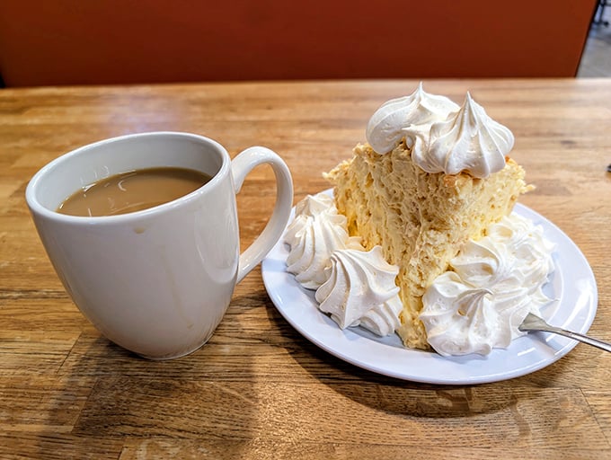 Coffee and coconut cream pie—the dynamic duo of diner desserts. That meringue stands prouder than a Florida retiree showing off vacation photos.