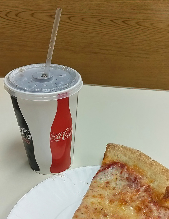 The classic companion to any Cenzo's feast—a fountain soda and slice combo that takes you back to simpler, happier times.